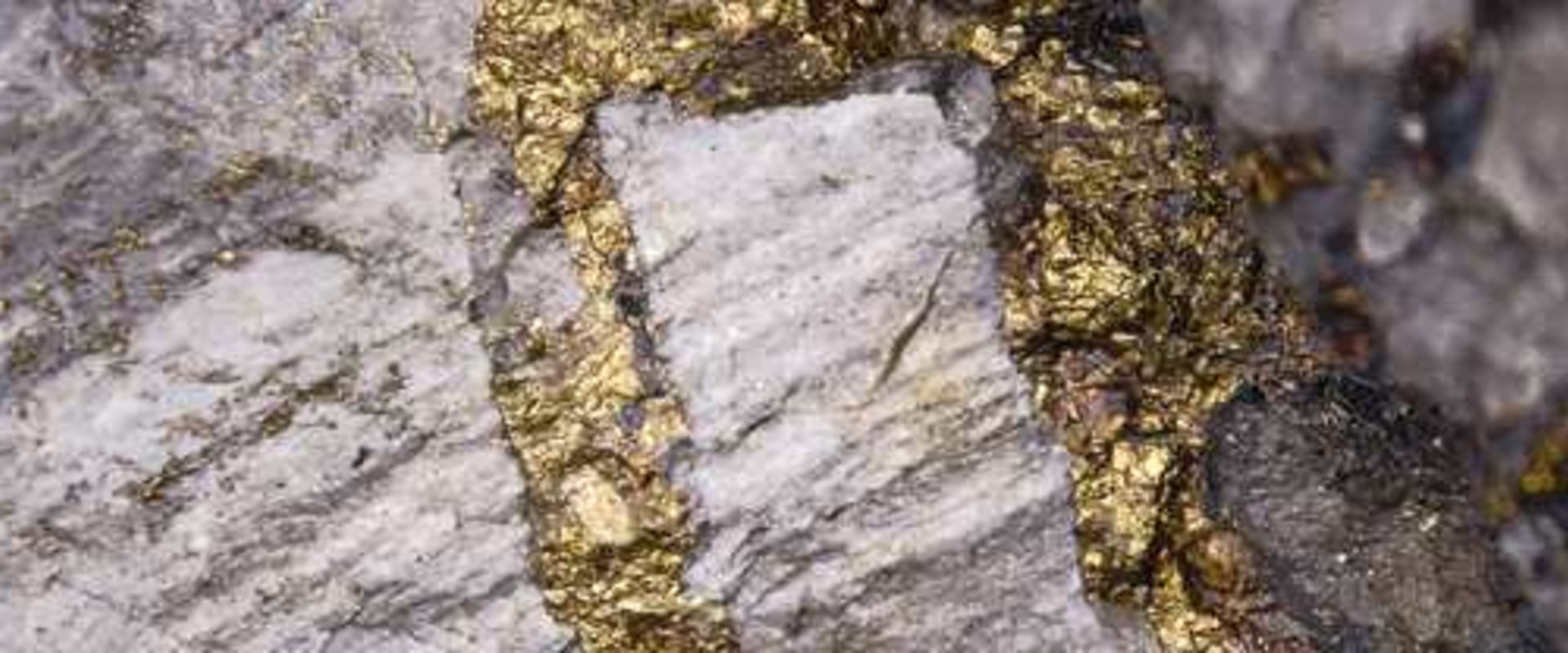 Where is gold located in the earth?